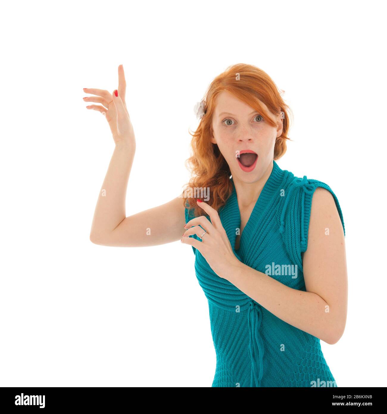 Woman pointing enthusiastic above isolated over white background Stock ...