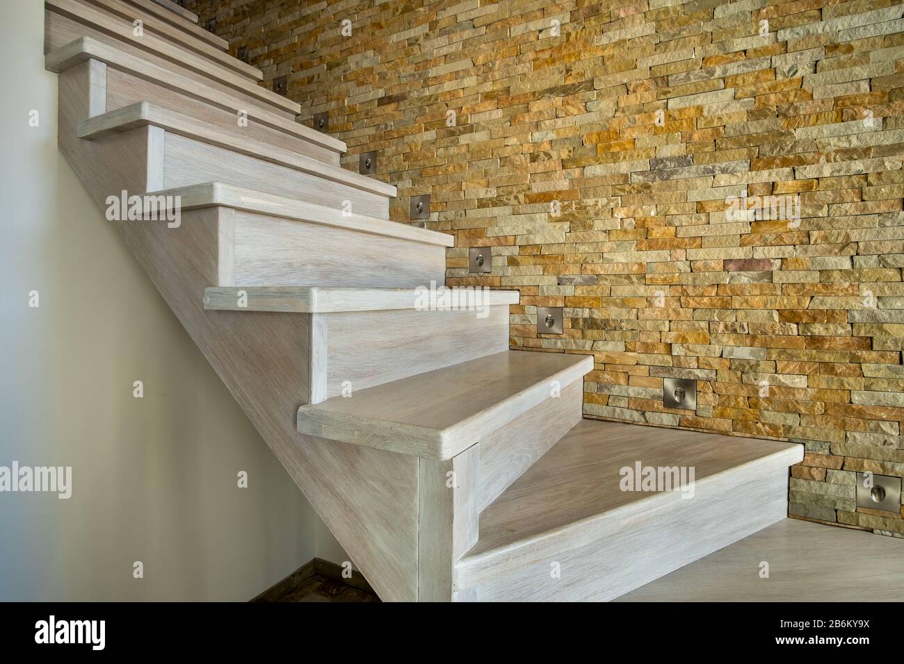 Stylish wooden contemporary staircase inside loft house interior ...