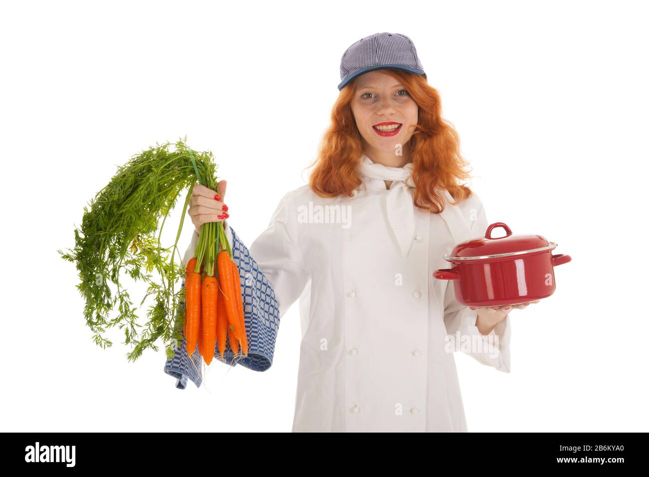 Female cook chef with red hair and baked bread isolated over white ...