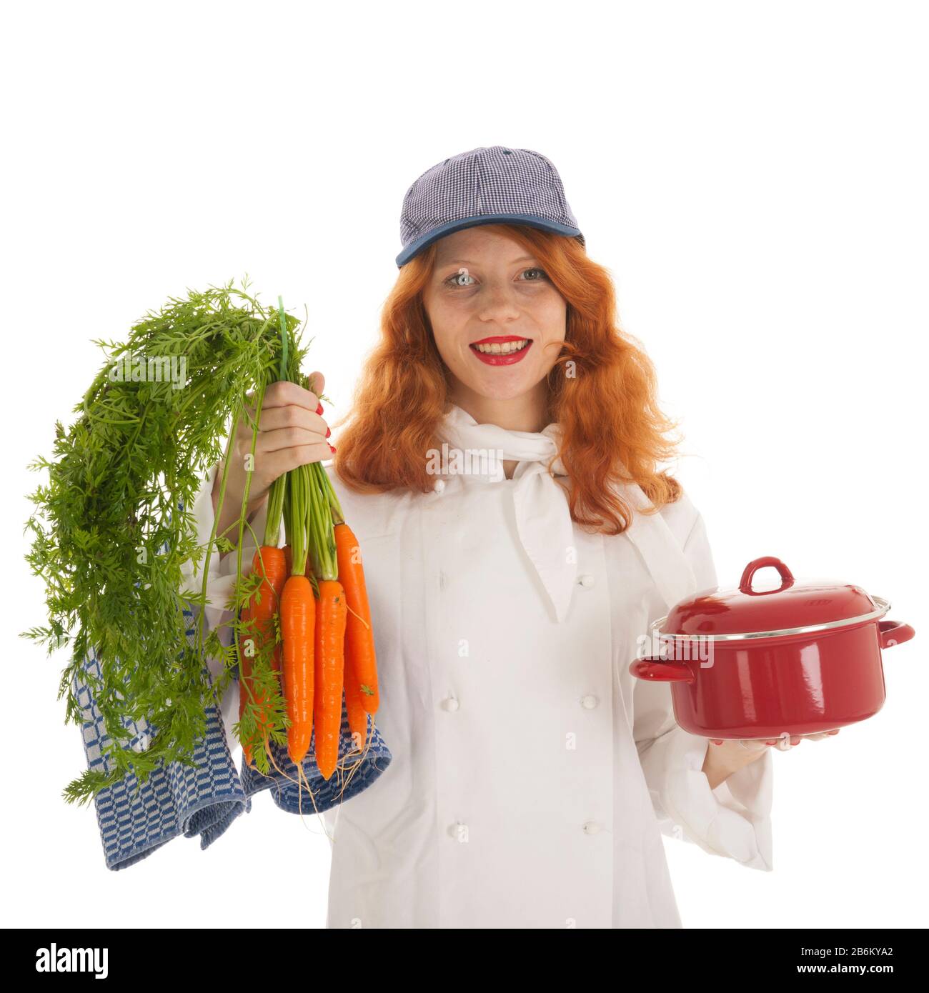 Female cook chef with red hair and baked bread isolated over white ...