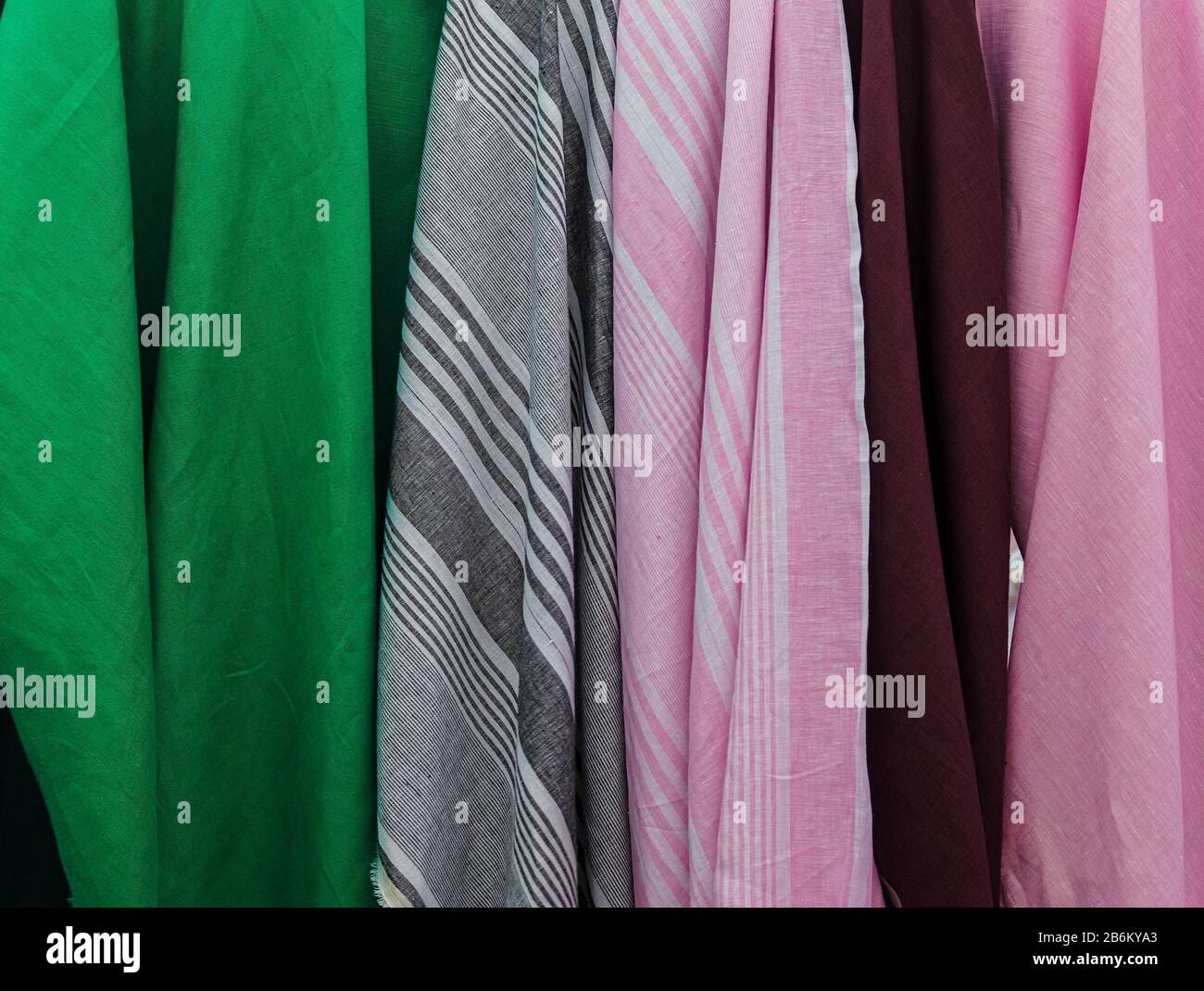 Colorful folded textile and fabric texturs in a close up view Stock ...