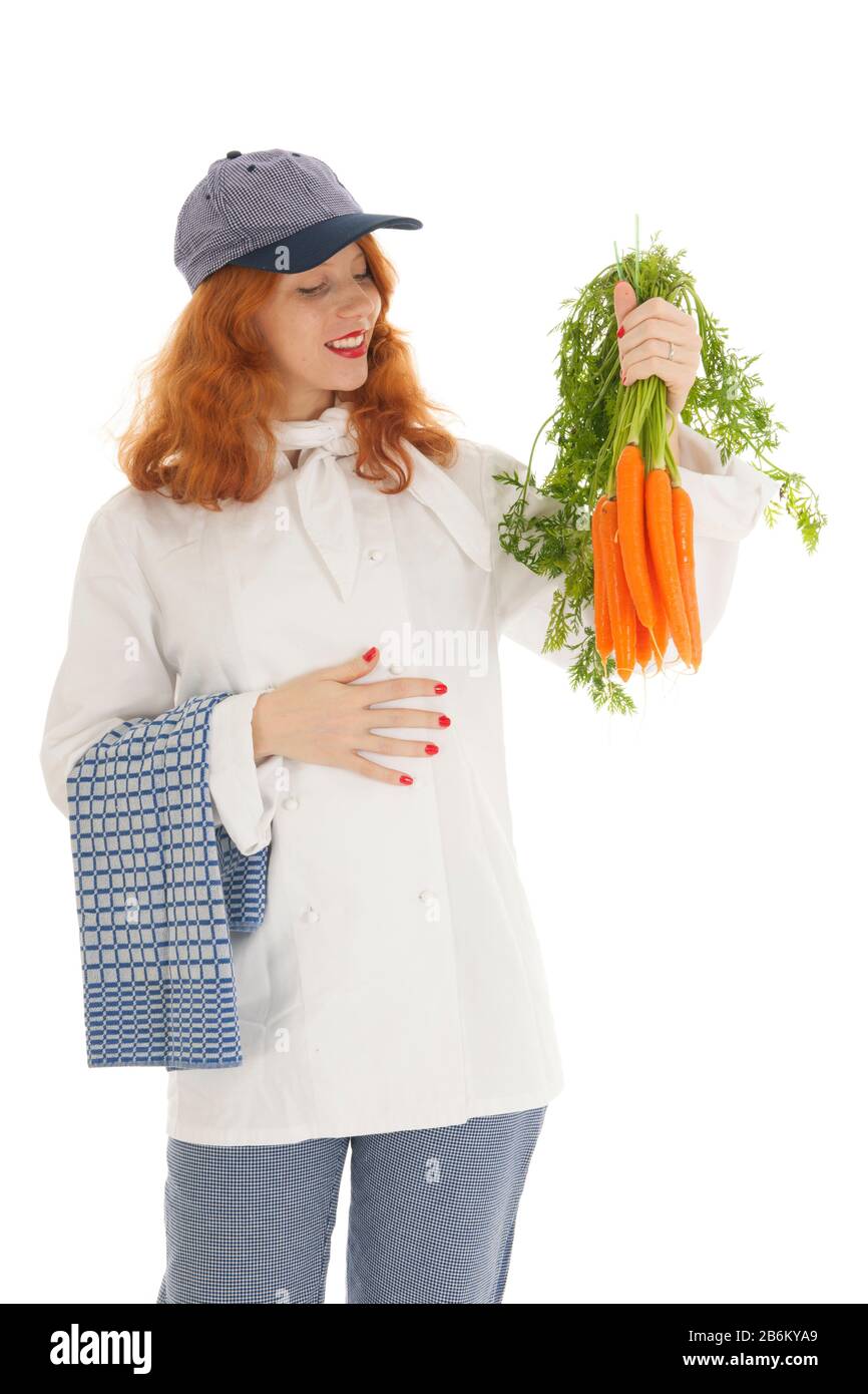 Female cook chef with red hair and baked bread isolated over white ...