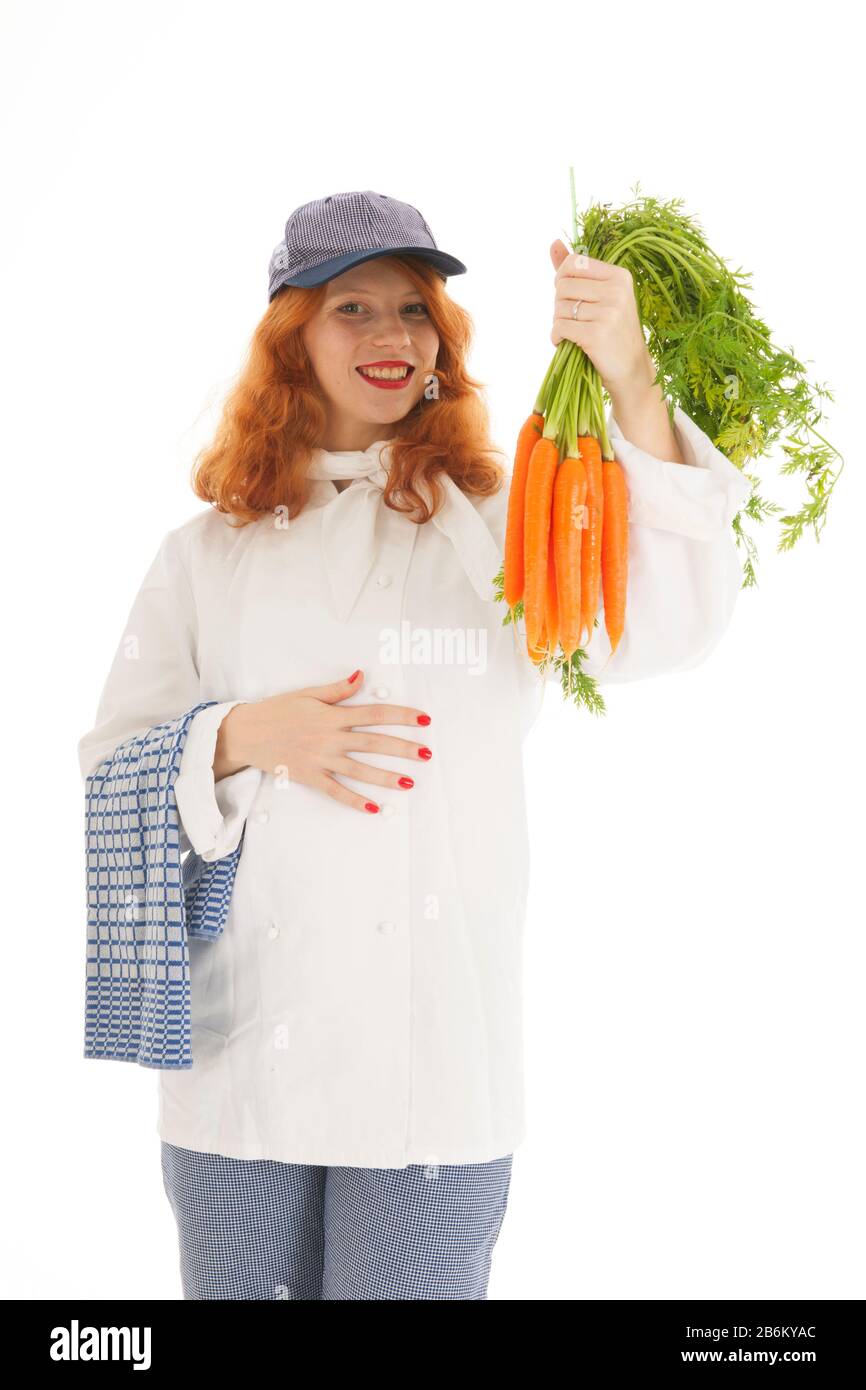 Female cook chef with red hair and baked bread isolated over white ...