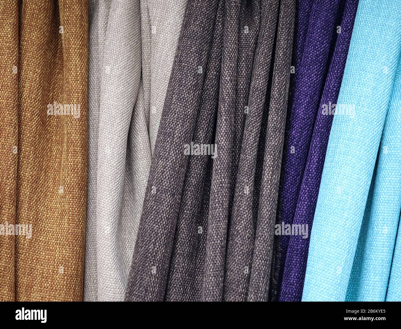 Colorful folded textile and fabric texturs in a close up view Stock ...