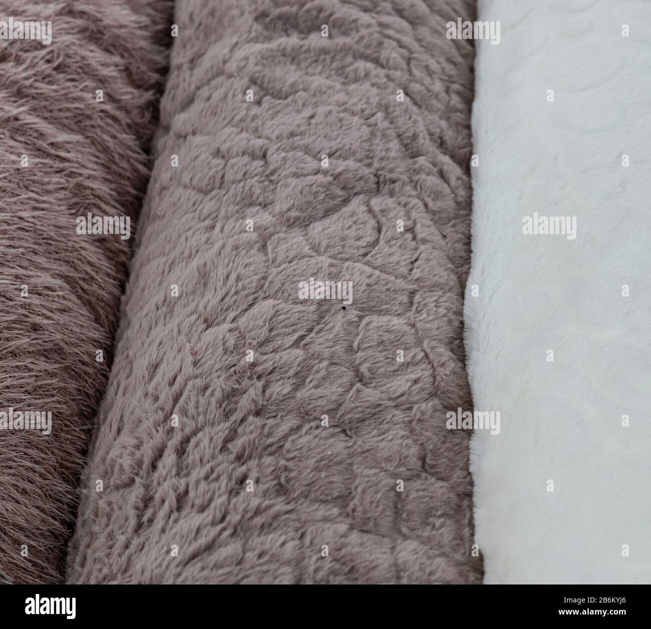 Colorful folded textile and fabric texturs in a close up view Stock ...