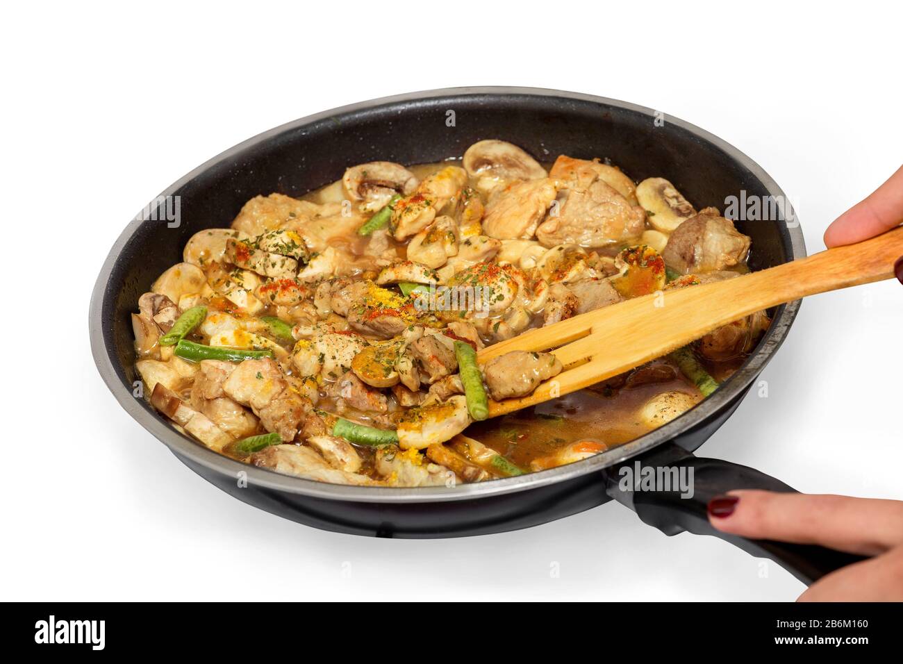 Chief cooking meat in a frying pan isolated Stock Photo - Alamy