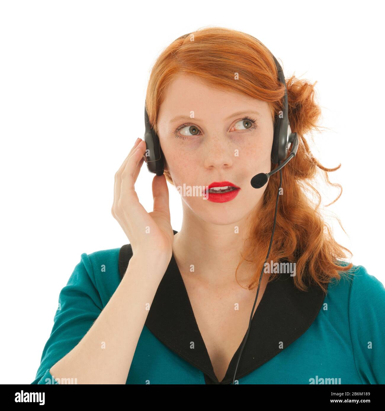 Young red haired woman with head set for call center Stock Photo - Alamy