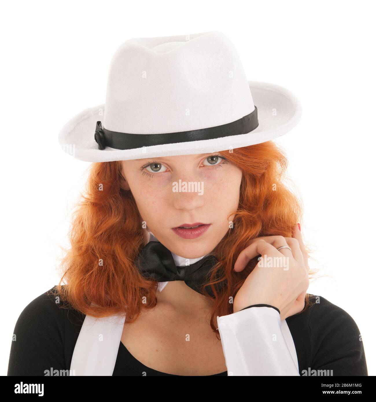 Woman as dandy with hat and other accessories isolated over white ...