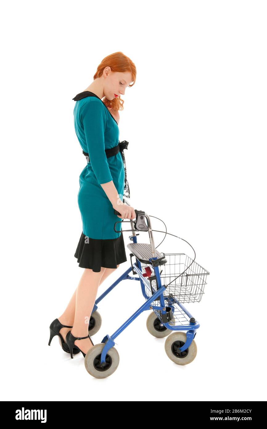 Disabled young woman with walker Stock Photo - Alamy