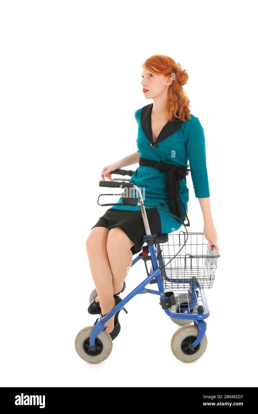 Disabled young woman with walker Stock Photo - Alamy
