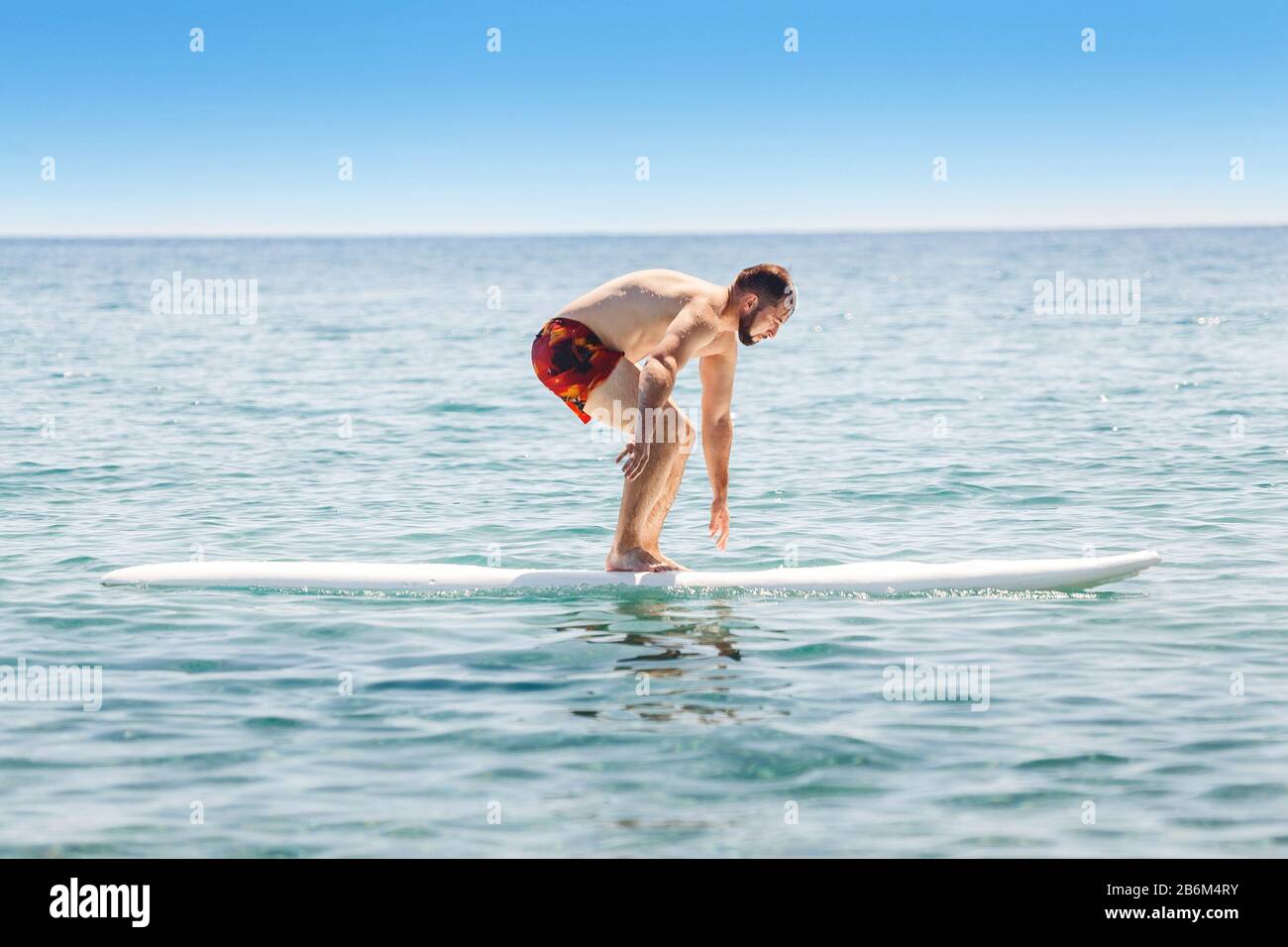 Learn to ride a surfboard hi-res stock photography and images - Alamy