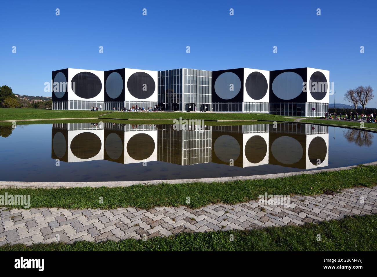Visitors Outside the Vasarely Foundation or Art Museum, Reflected in ...