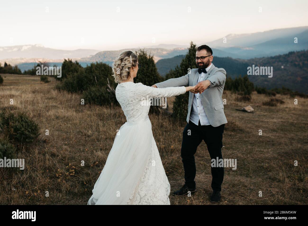 Beautiful couple having a romantic moment on their weeding day, in ...