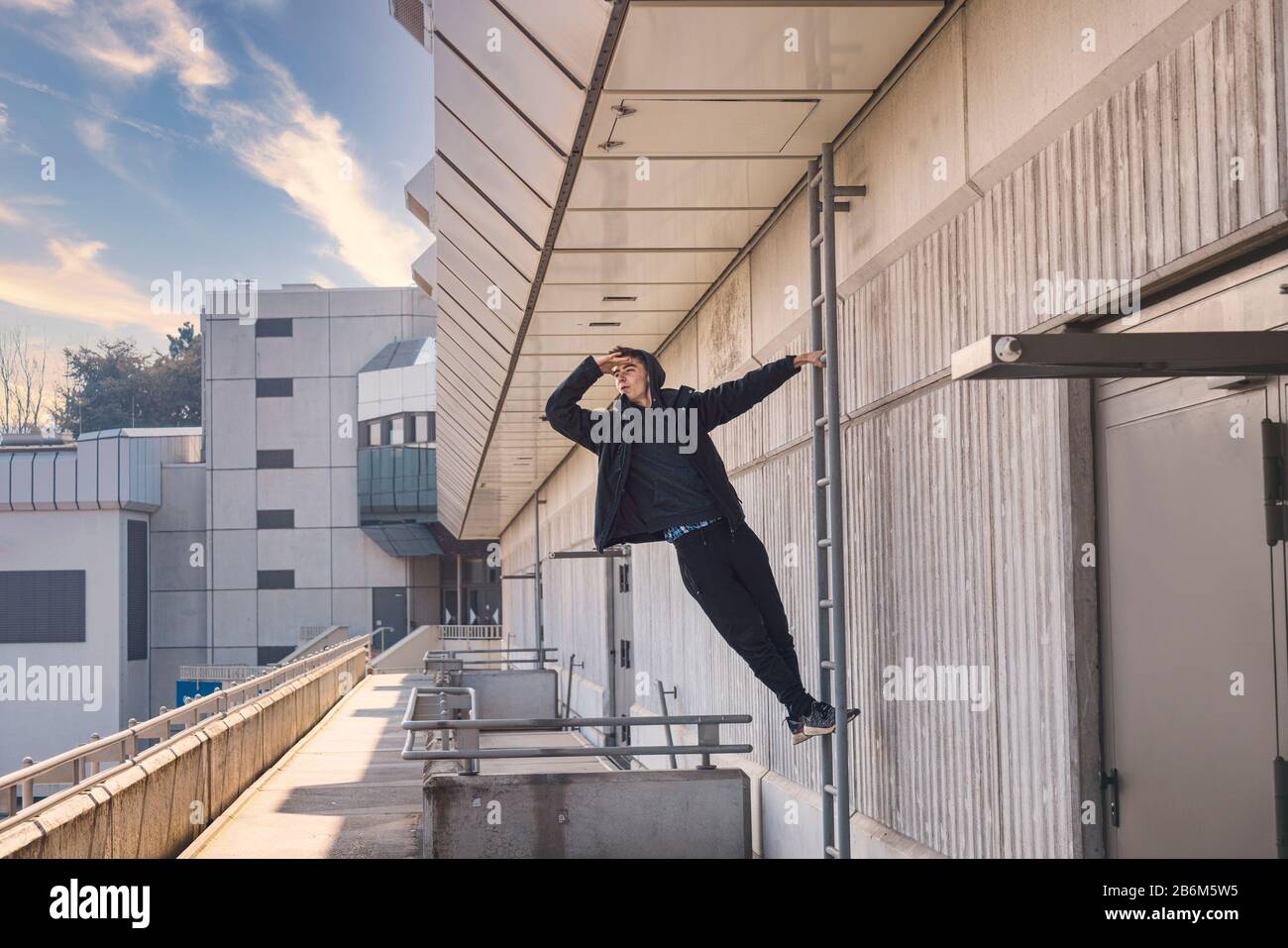Climbing ladder teenager hi-res stock photography and images - Alamy
