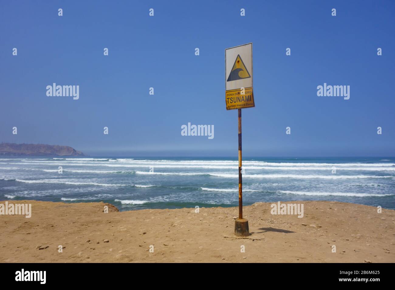 Warning sign of Tsunami danger over ocean Stock Photo - Alamy