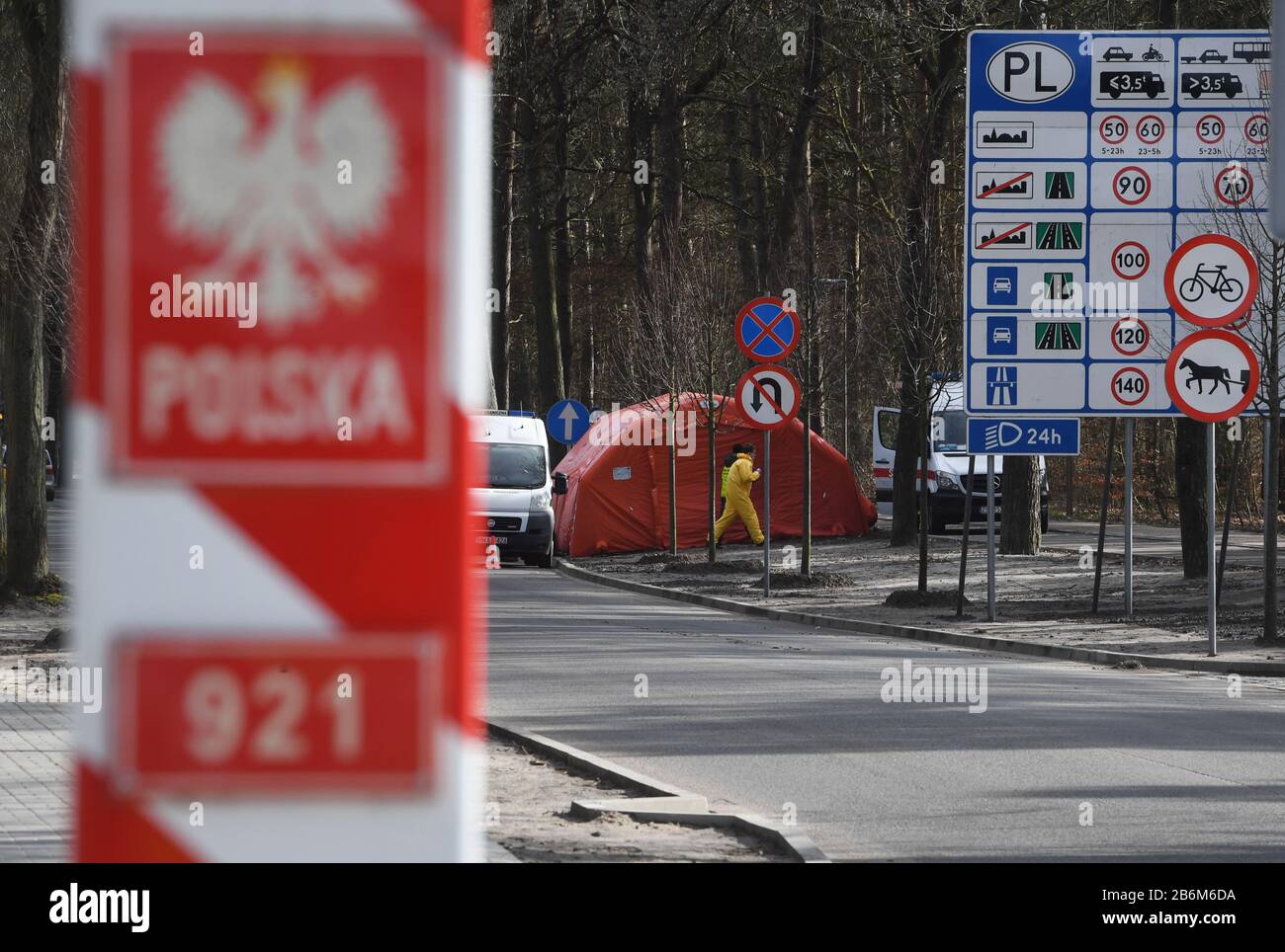 11 March 2020, Poland, Swinoujscie: An employee of the Polish rescue ...