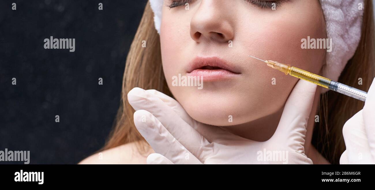 Young pretty woman studio portrait. Cosmetology injection concept Stock ...