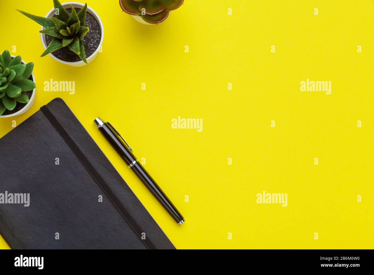 School stationery on a yellow table, background. Creative, educational ...