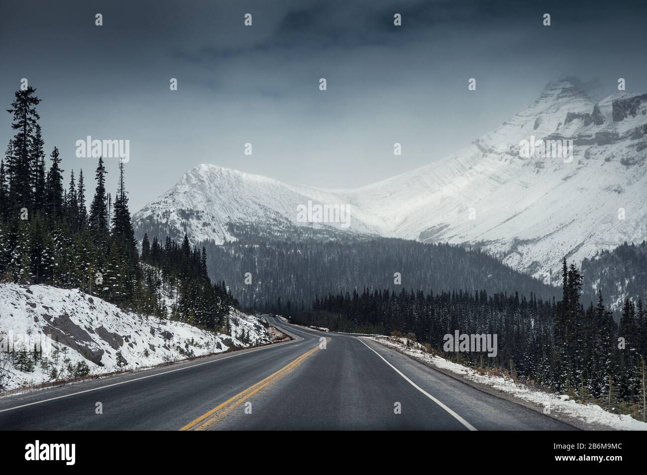Scenic highway road trip with snow mountain in gloomy at Icefields ...