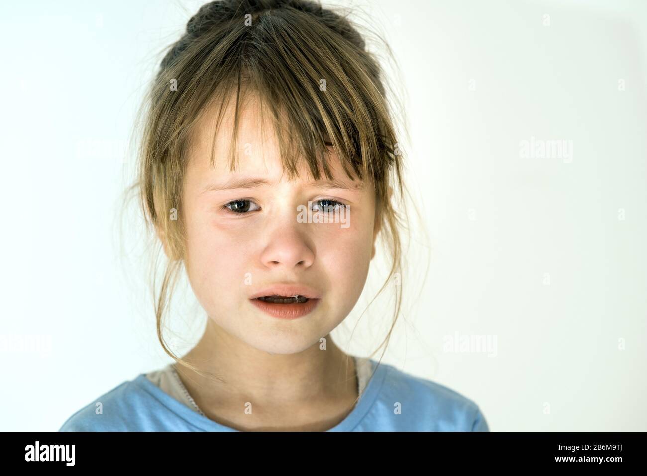 Closeup portrait of sad crying child girl Stock Photo - Alamy