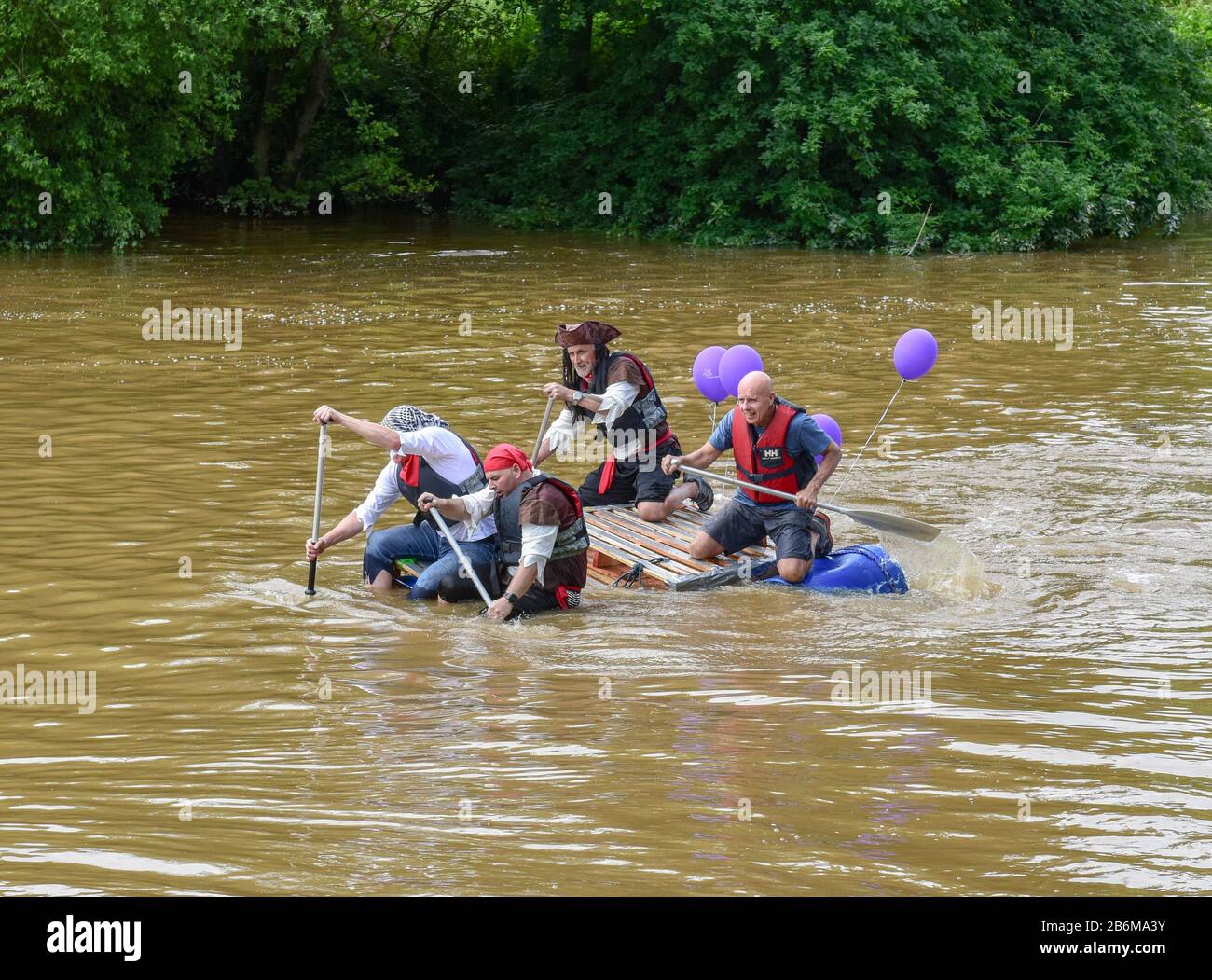 Kneeling on a raft hi-res stock photography and images - Alamy