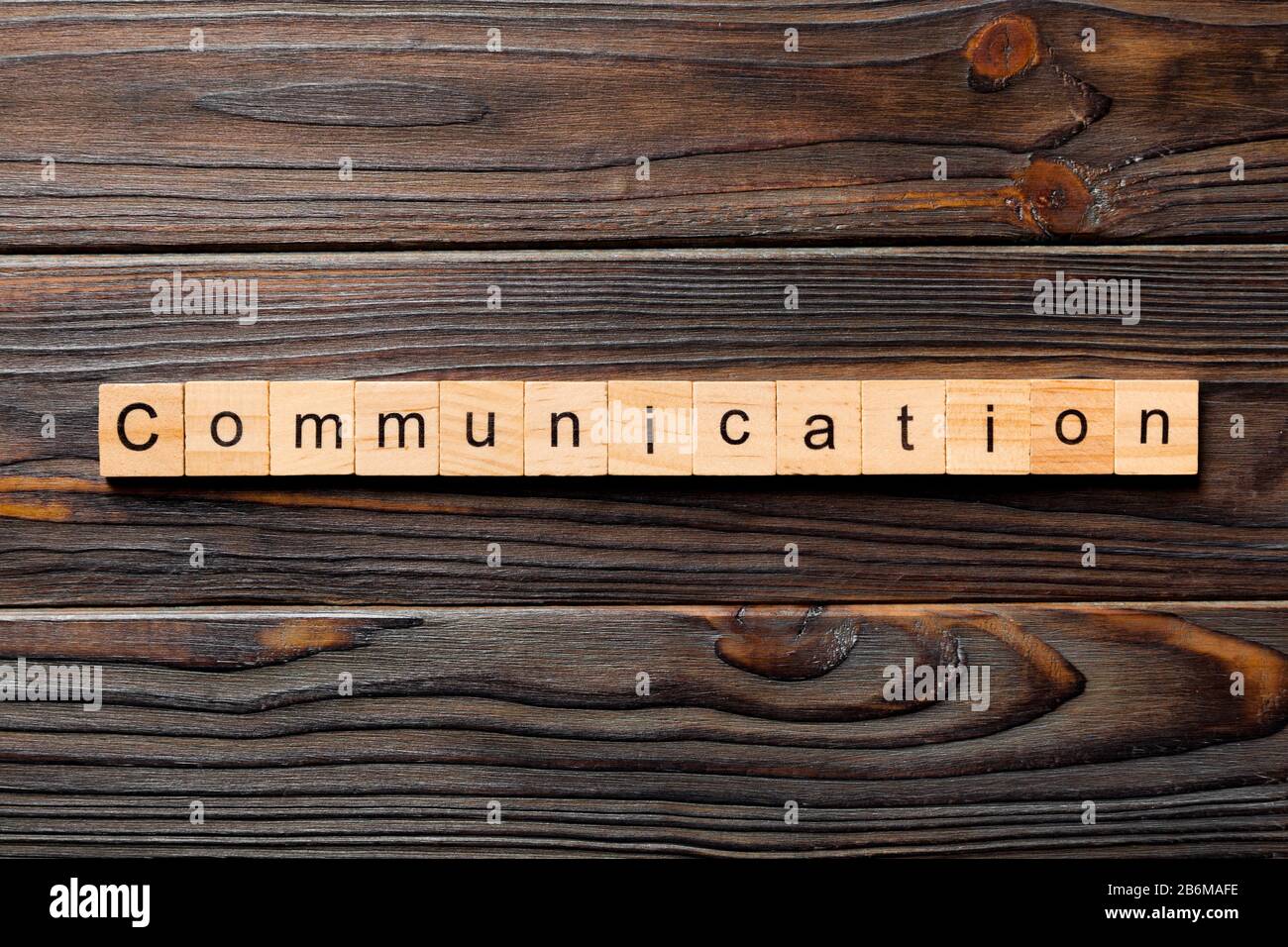 COMMUNICATION word written on wood block. COMMUNICATION text on wooden ...