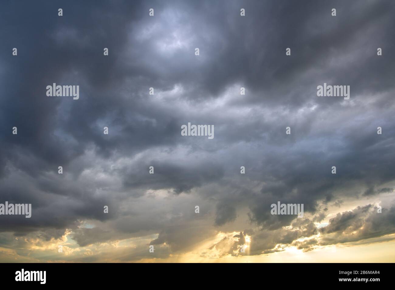 Sunset sky covered with dramatic storm puffy clouds before rain Stock ...