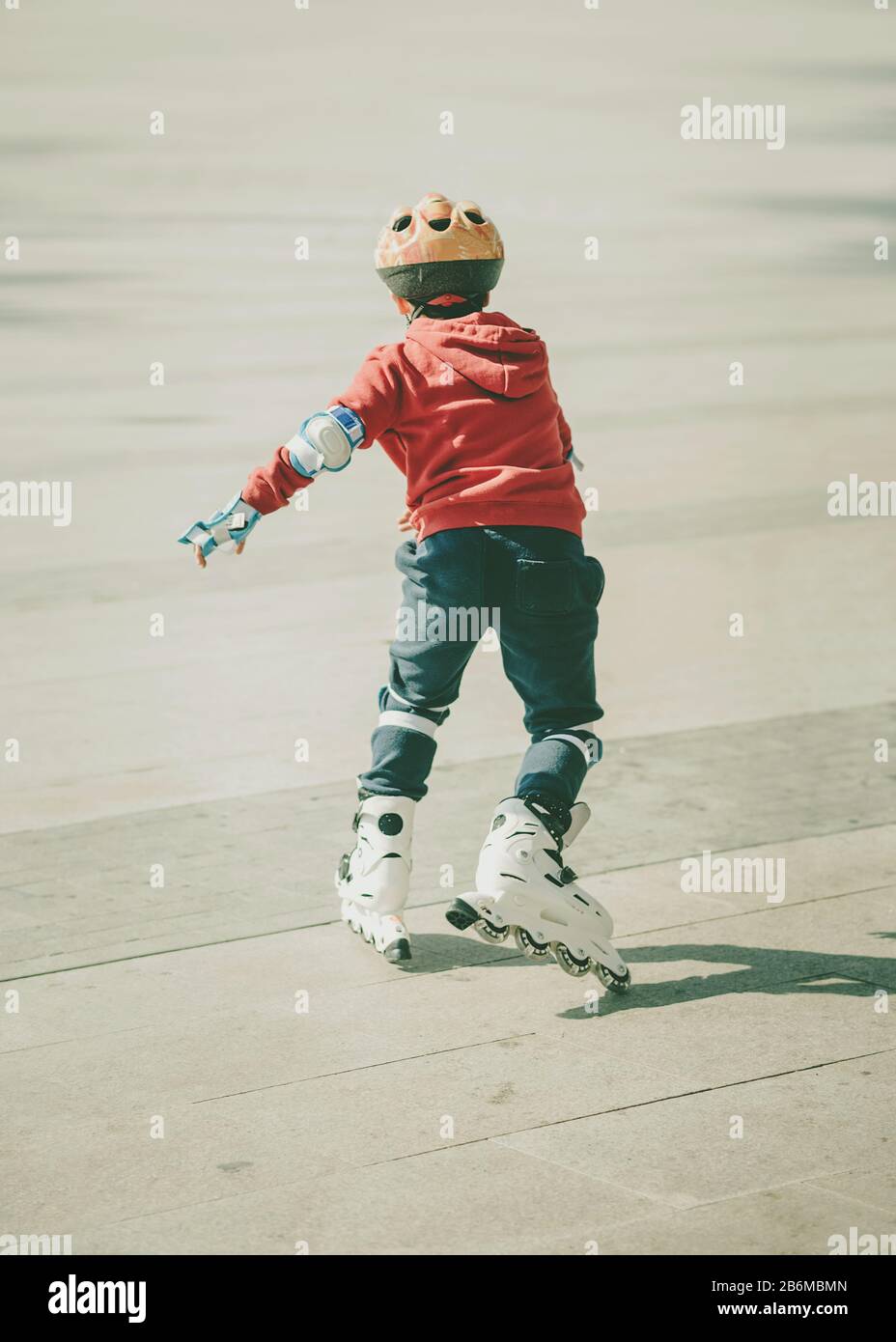 Child skating hi-res stock photography and images - Alamy