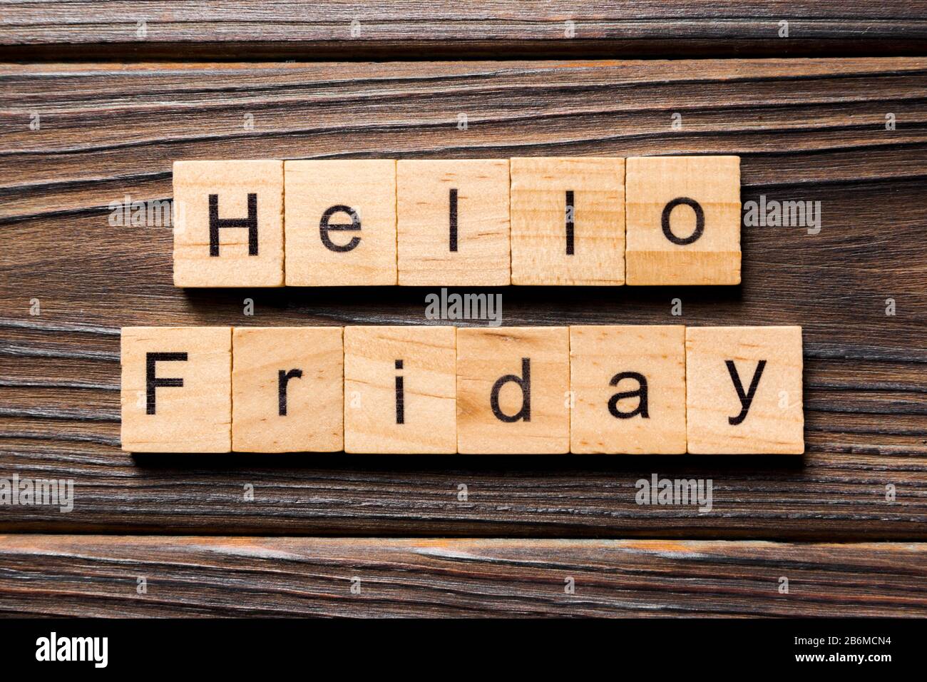 hello friday word written on wood block. hello friday text on wooden ...
