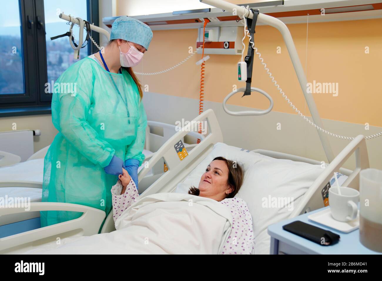 Nurse at infectious ward in hospital holding infusion, Karlovy Vary ...