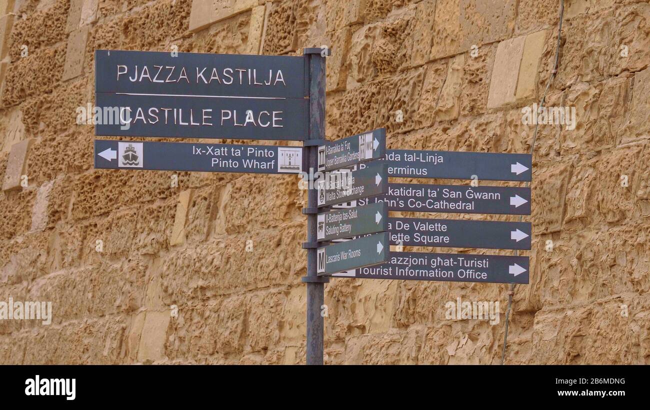 Direction signs in the city of Valletta Malta Stock Photo - Alamy