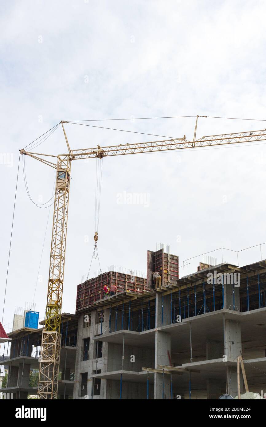 Industrial background made of crane construction at the buildings ...
