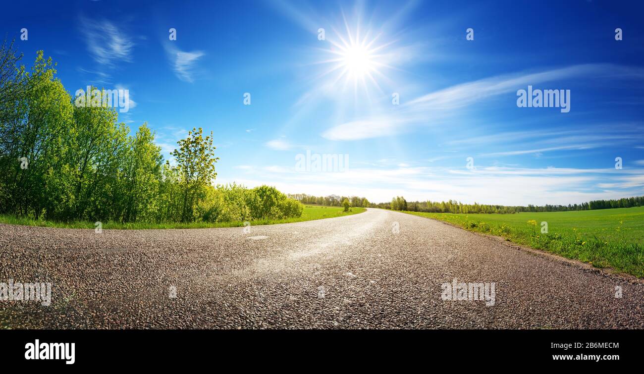 Empty asphalt road in open countryside hi-res stock photography and ...