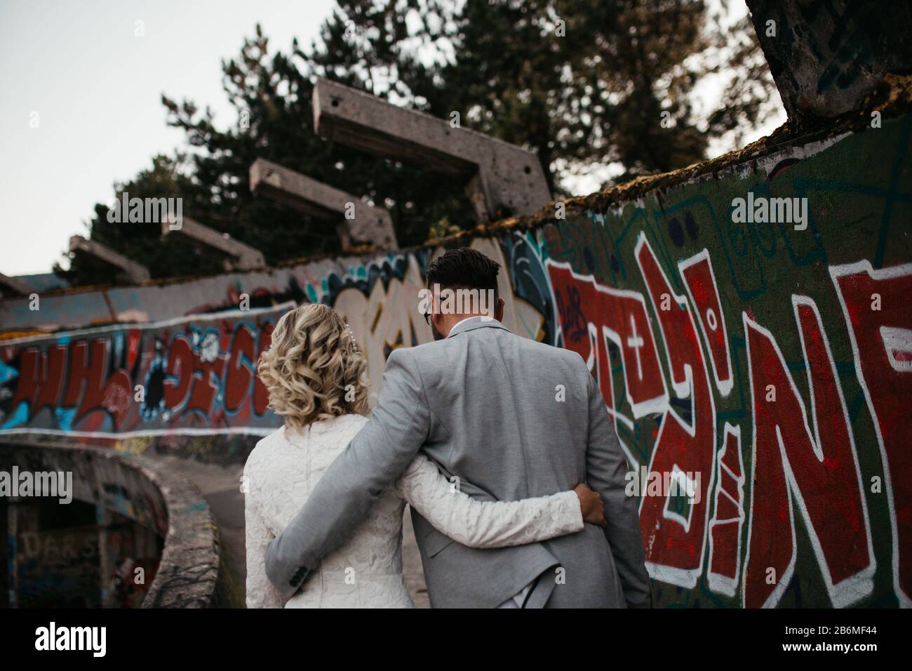 Beautiful couple having a romantic moment on their weeding day, in ...