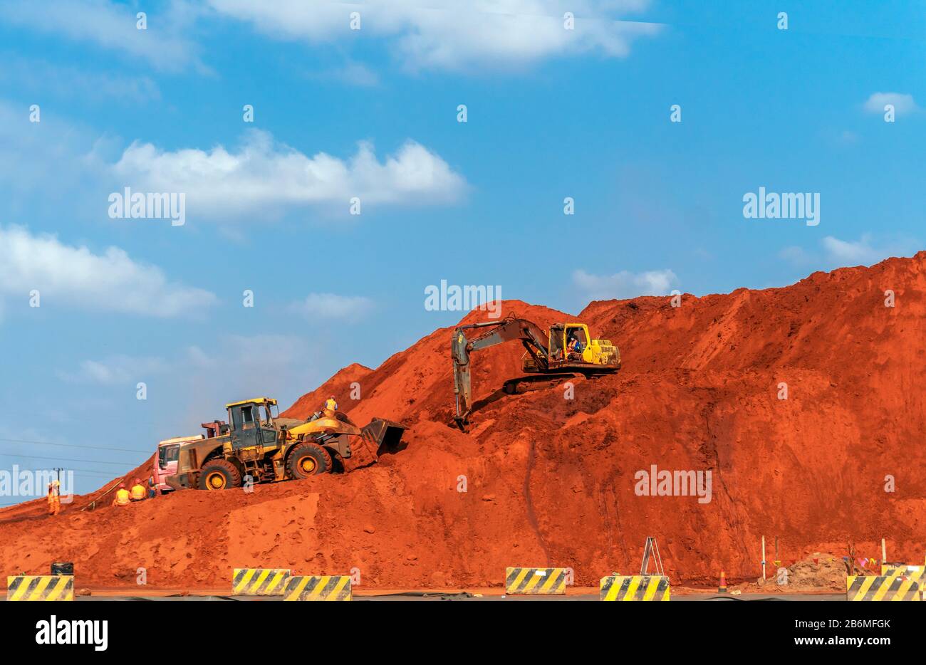 Road construction site with diggers and trucks, Maputo, Mozambique ...