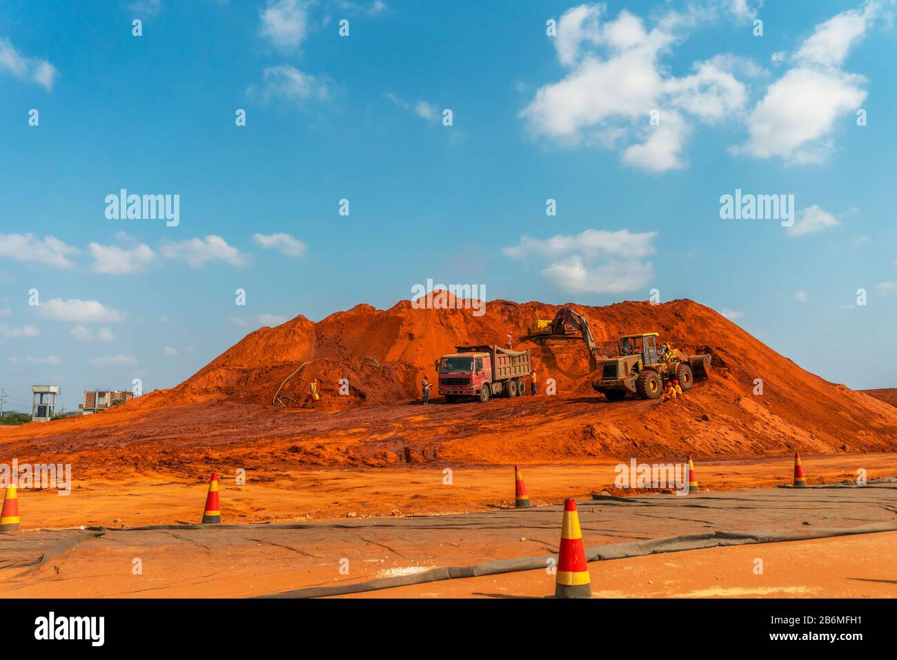 Road construction site with diggers and trucks, Maputo, Mozambique ...