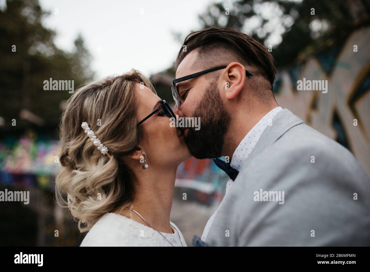 Beautiful couple having a romantic moment on their weeding day, in ...