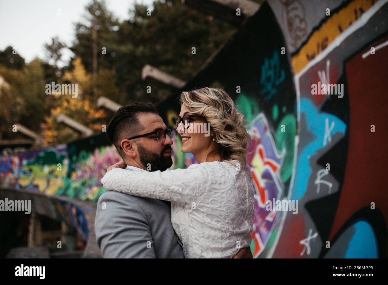 Beautiful couple having a romantic moment on their weeding day, in ...