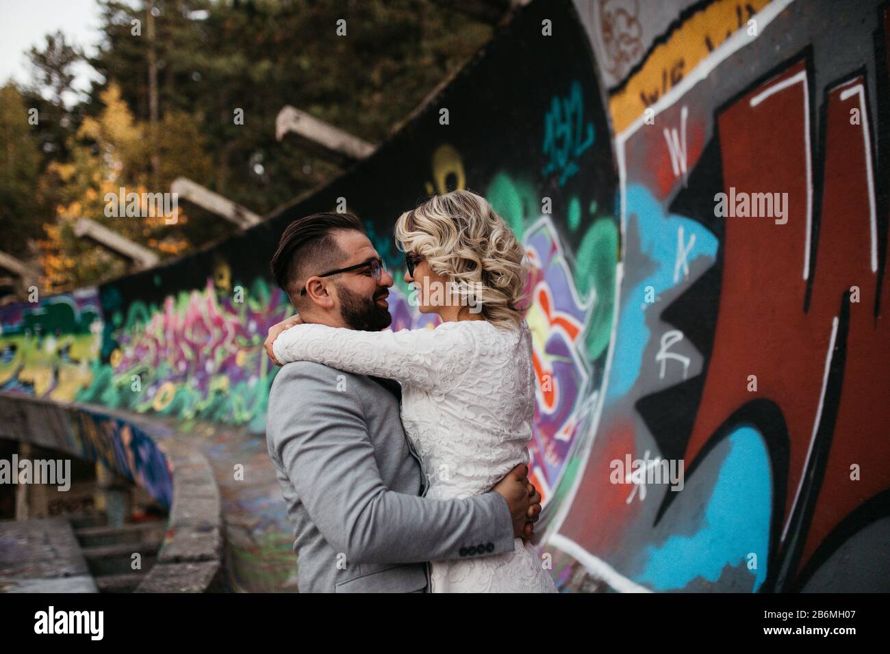 Beautiful couple having a romantic moment on their weeding day, in ...