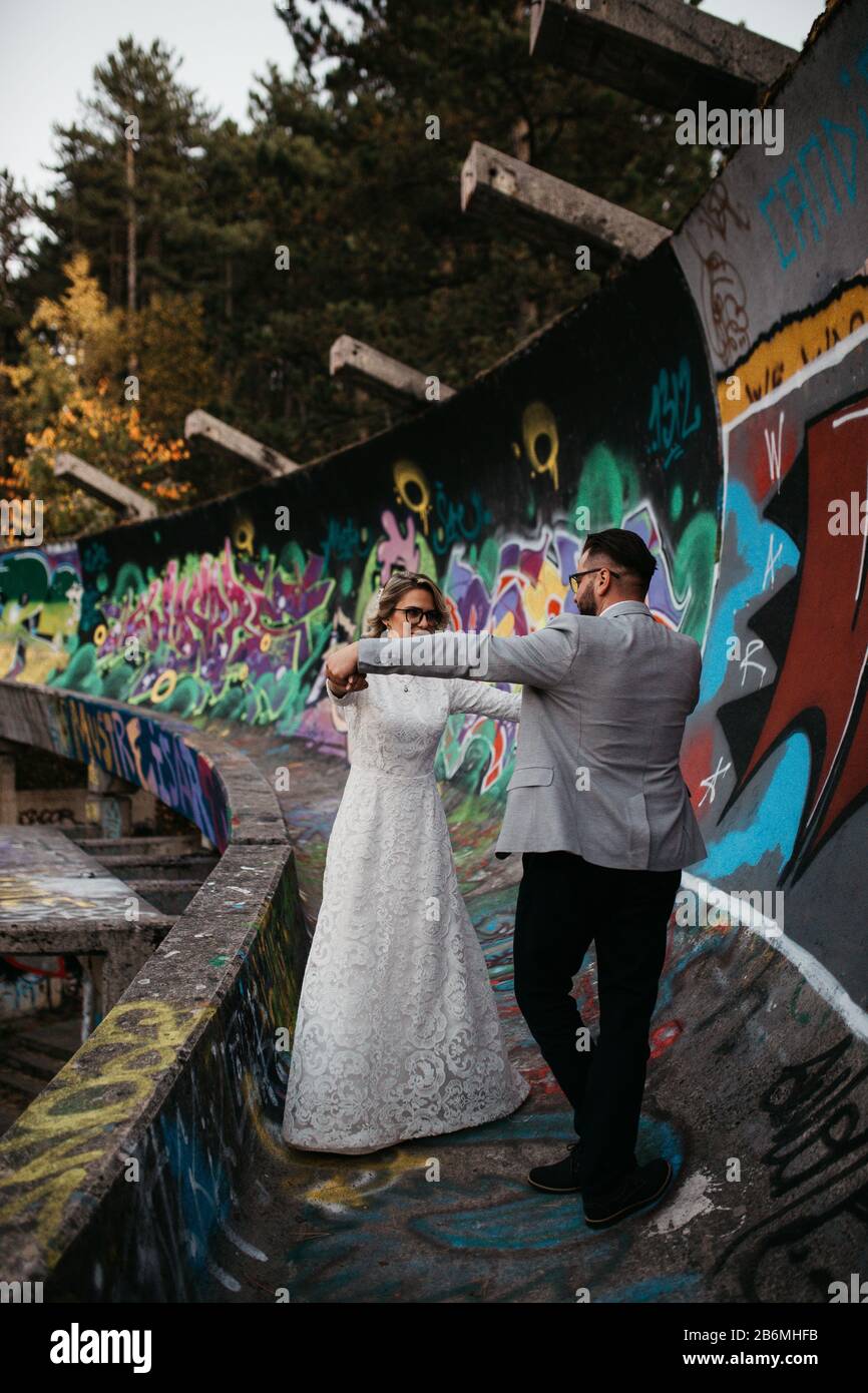Beautiful couple having a romantic moment on their weeding day, in ...