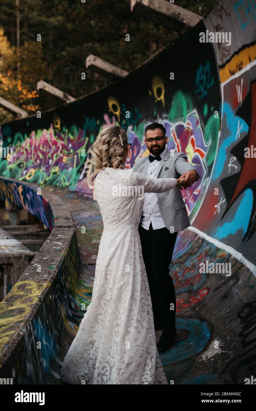 Beautiful couple having a romantic moment on their weeding day, in ...