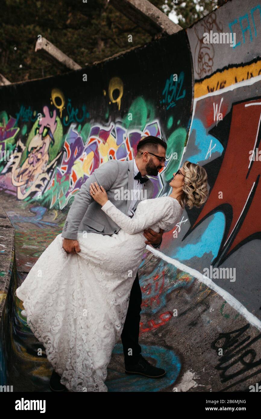 Beautiful couple having a romantic moment on their weeding day, in ...