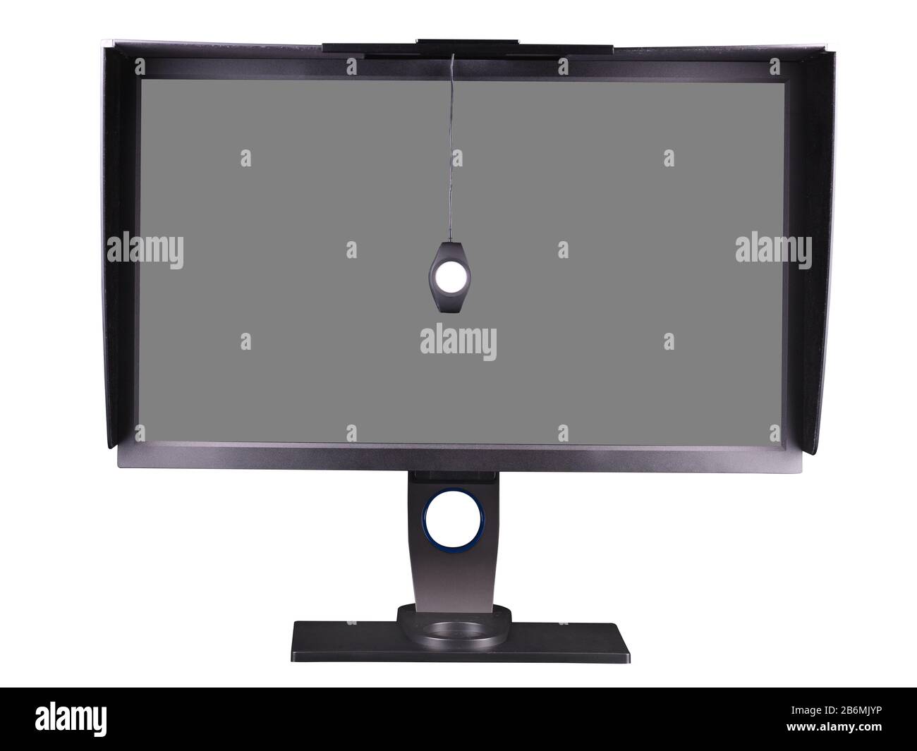 Professional monitor with shading hood and calibrator isolated on white ...