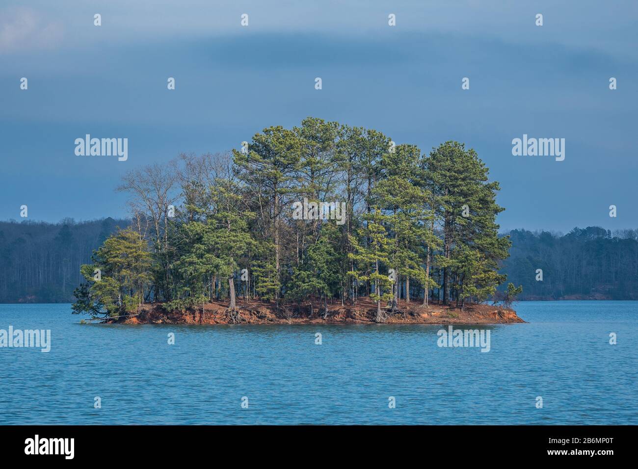An island out in the middle of Lake Lanier Georgia with the sunlight ...