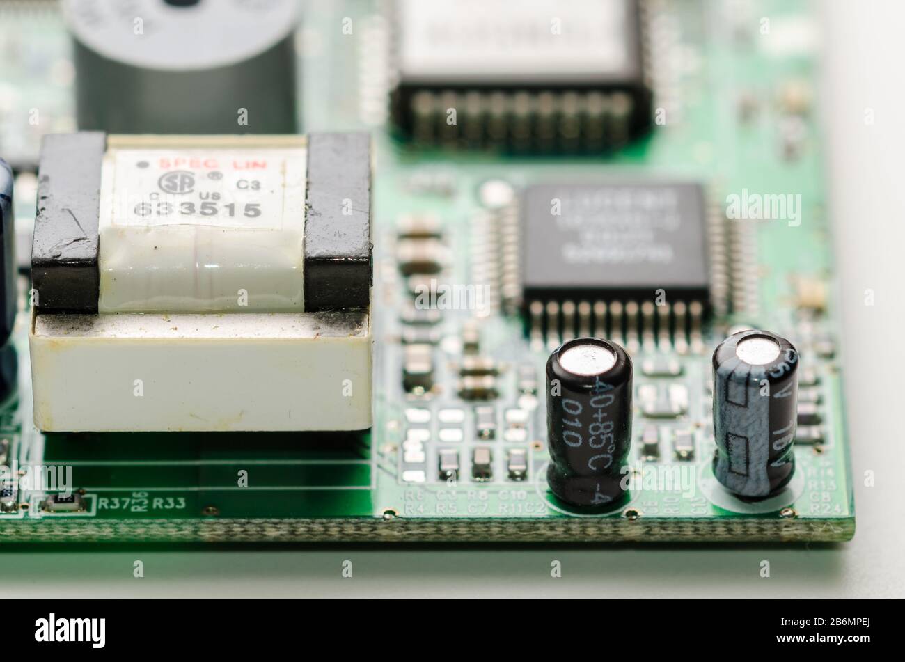 Close up macro of computer hardware modem circuit board, modulator ...