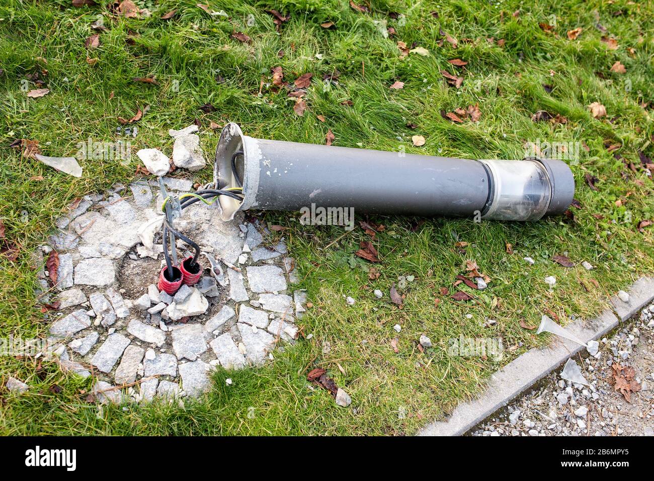 Streetlight Broken lamp by hooligans in city park, vandalism concept ...