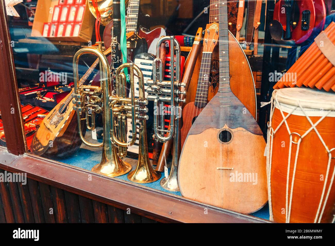 Musical store window with various instruments Stock Photo - Alamy