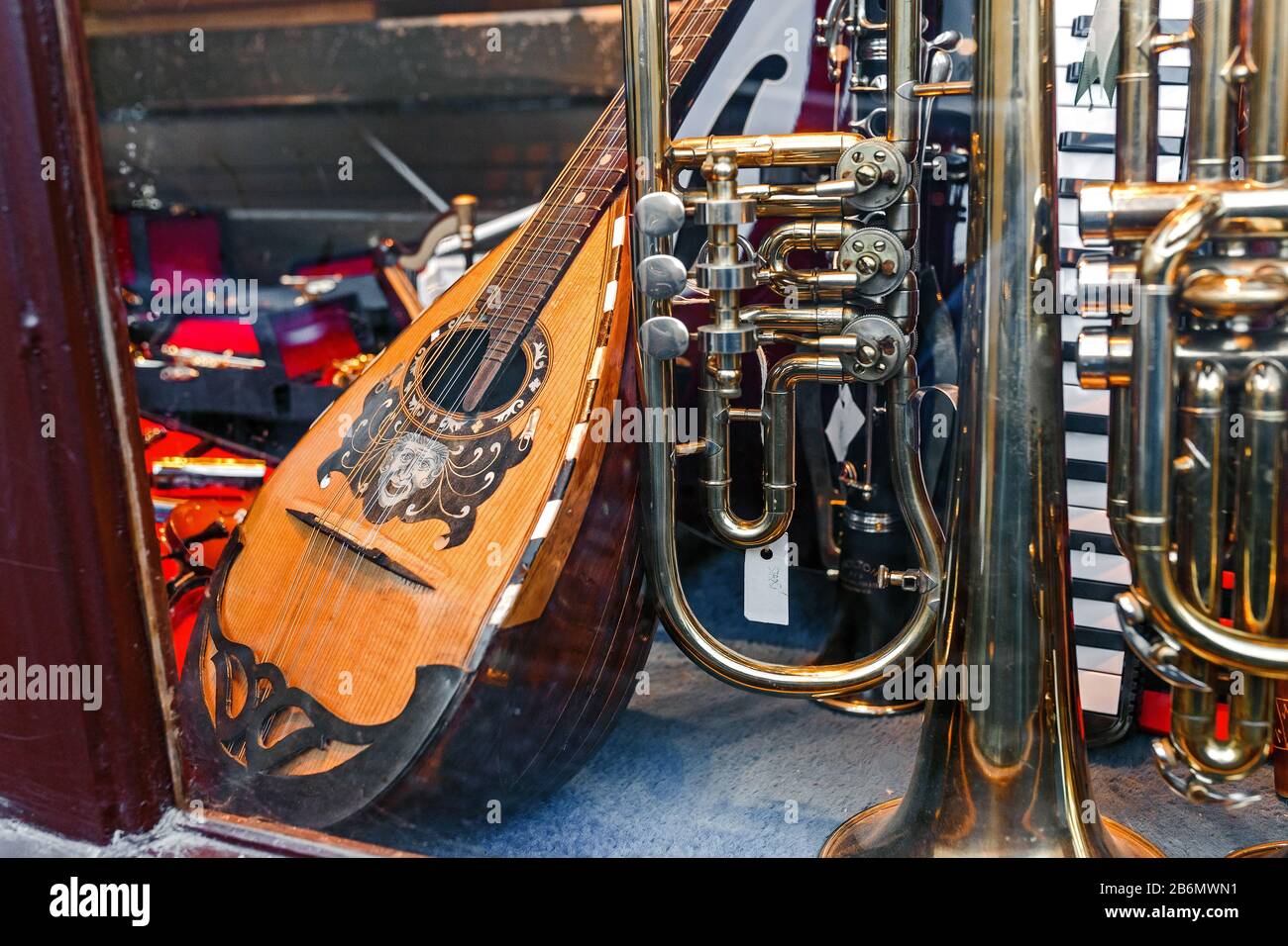Musical store window with various instruments Stock Photo - Alamy