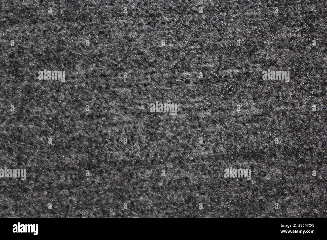 The picture shows a grey textile background with a structure Stock ...