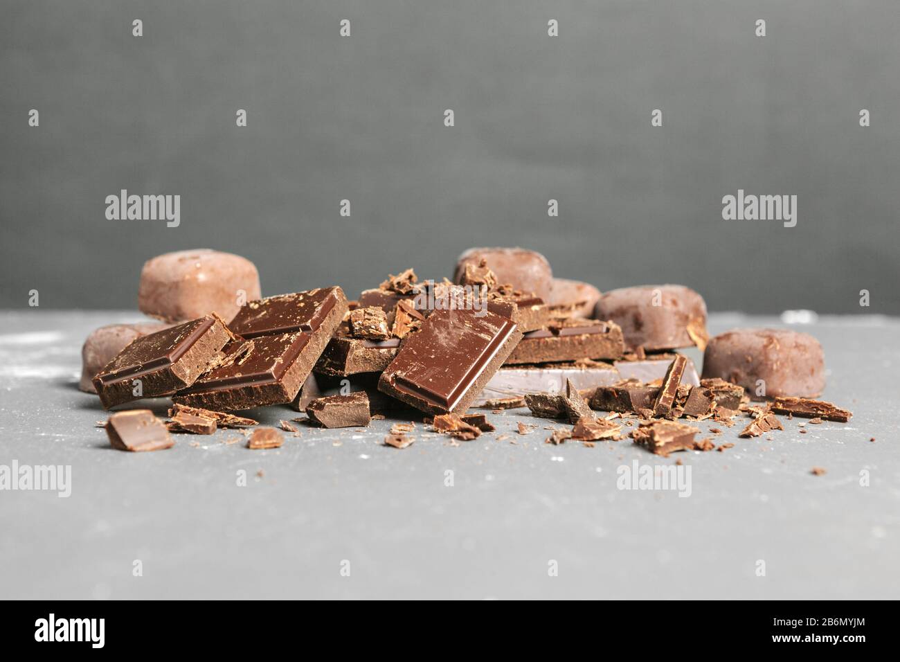 Dark chocolate stack close up. creative photo Stock Photo - Alamy